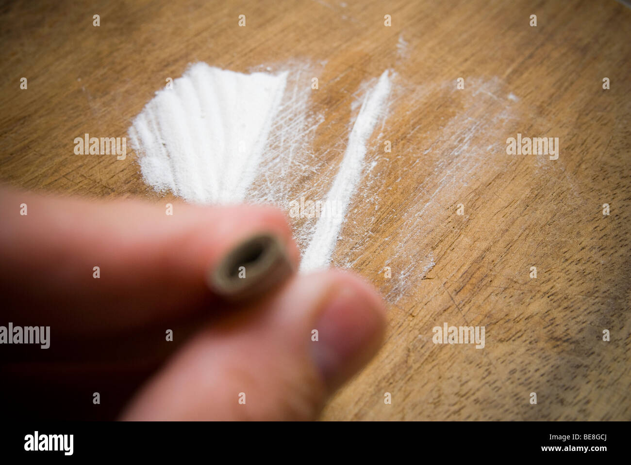Drugs, a person handling class A drugs Stock Photo - Alamy