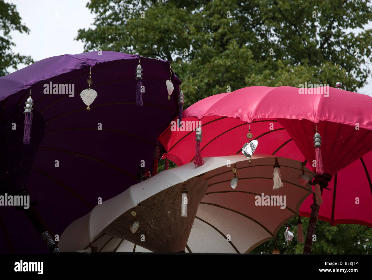 Display of coloured sun parasols London UK Stock Photo - Alamy