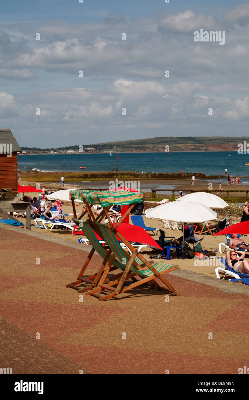 two striped deck chairs on the seafront promenade at shanklin isle of ...
