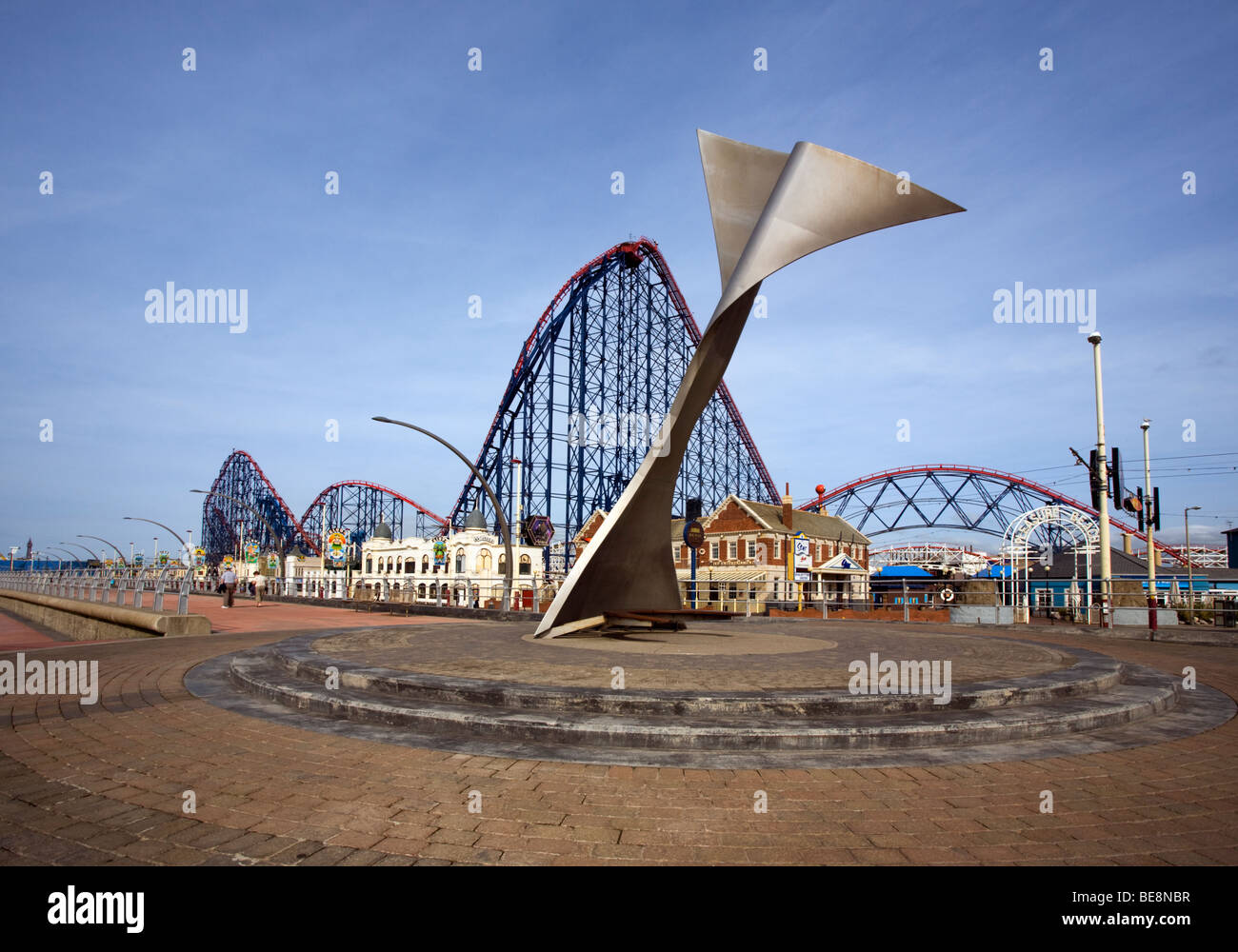 Modern bench on Blackpool South Promenade with the Big One roller ...