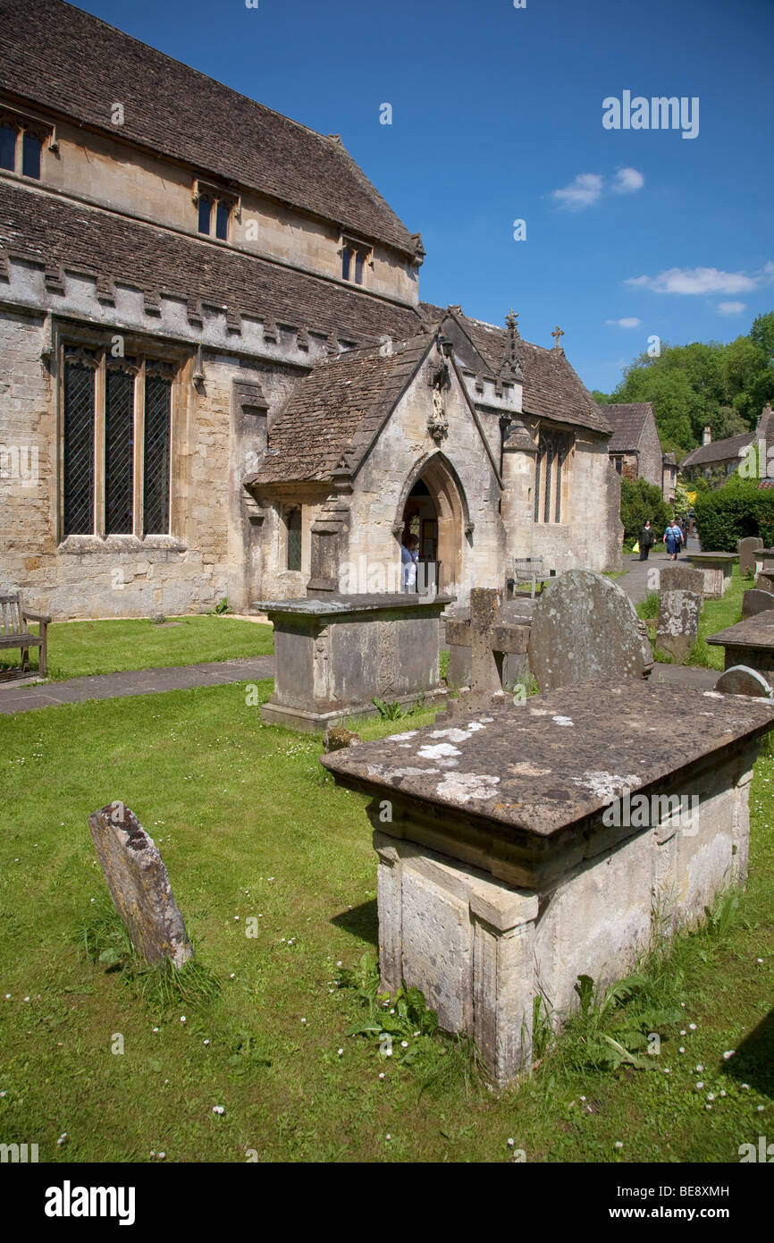 The churchyard at St Andrew's Church in the village of Castle Combe ...