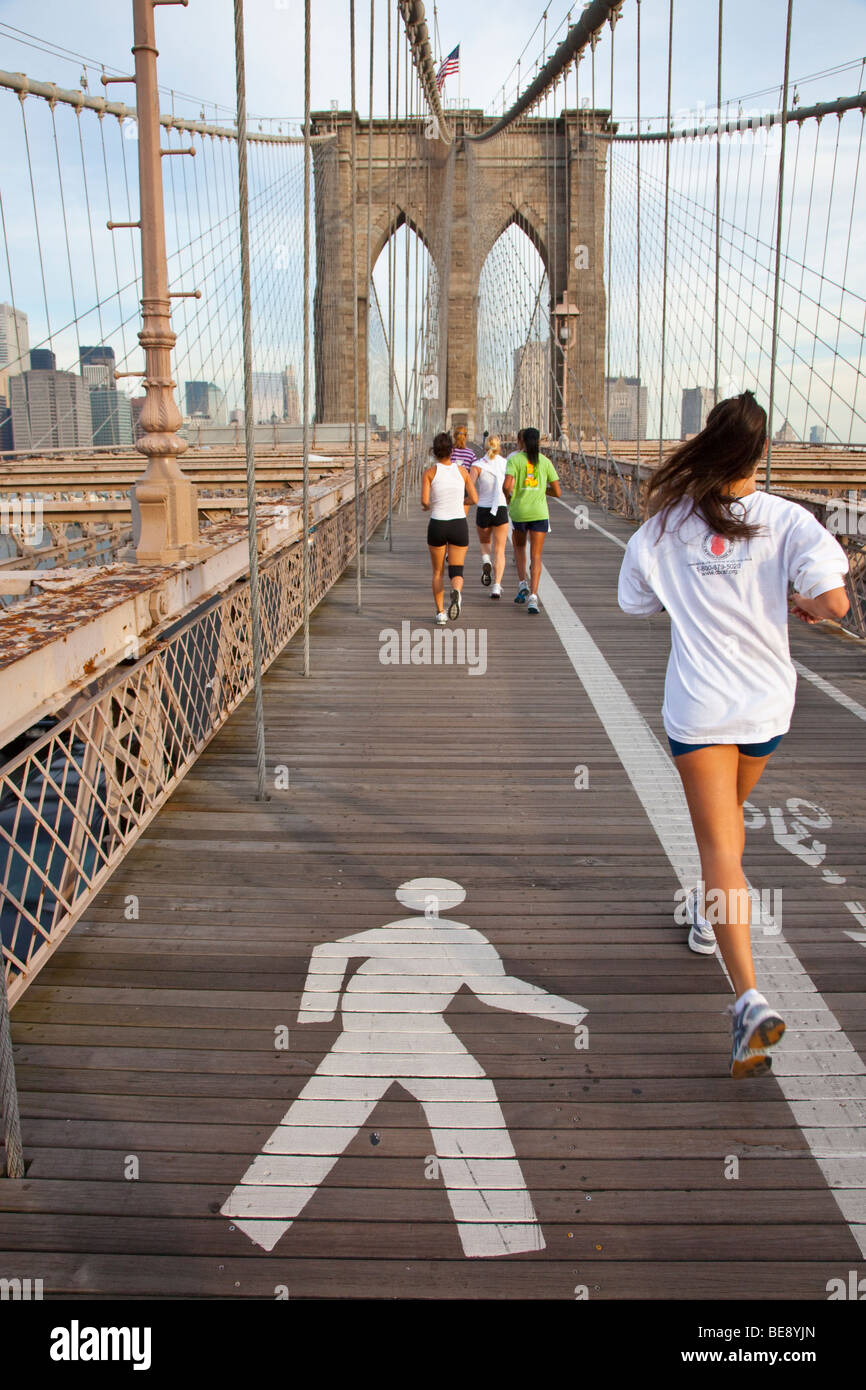 Runners on the Brooklyn Bridge in New York City Stock Photo - Alamy