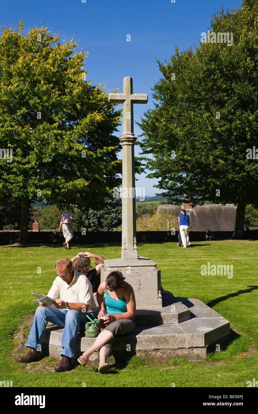 People relax in sunshine on church lawn during Ludlow Food Festival ...