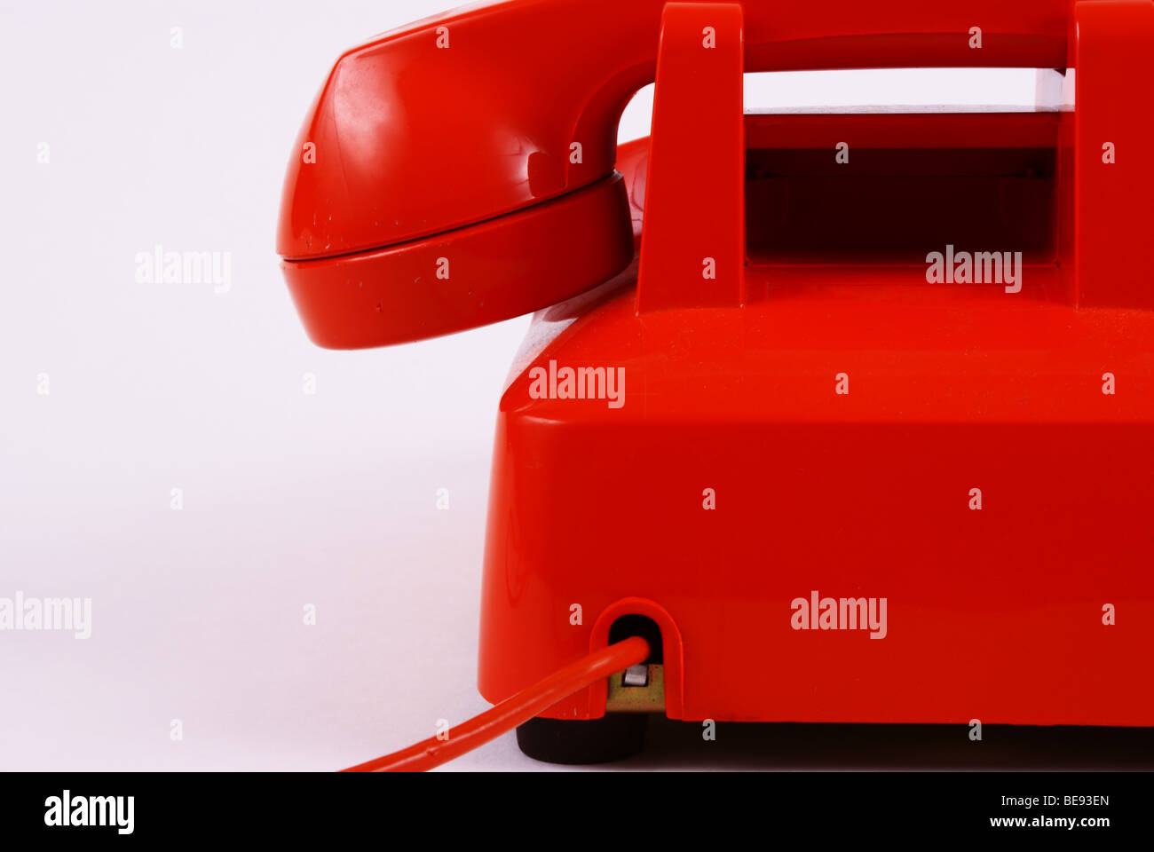 The back of and old orange rotary telephone Stock Photo - Alamy