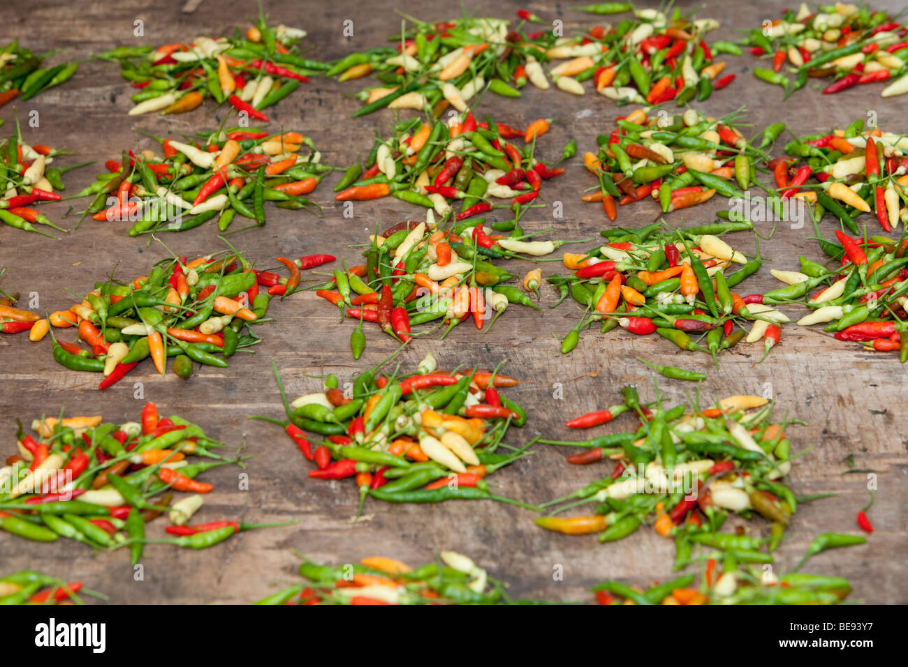 Stand with vegetables and chilli at a lively fish market, Sir Selwyn ...