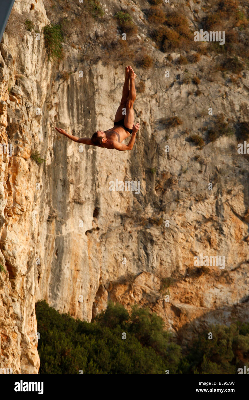 Boy diving rock hi-res stock photography and images - Alamy