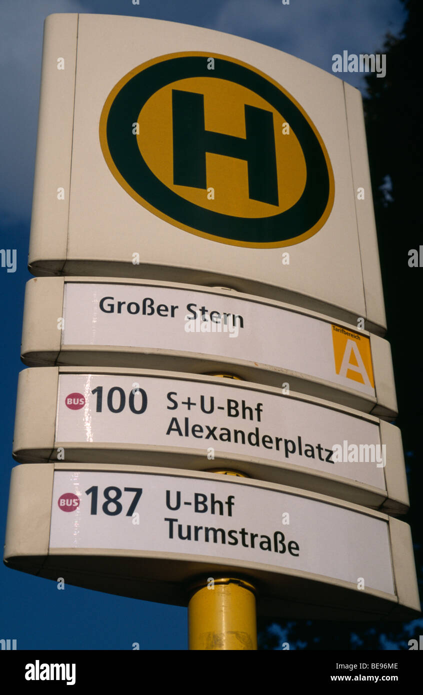 GERMANY Berlin Bus and tram stop sign, green H within yellow circle ...