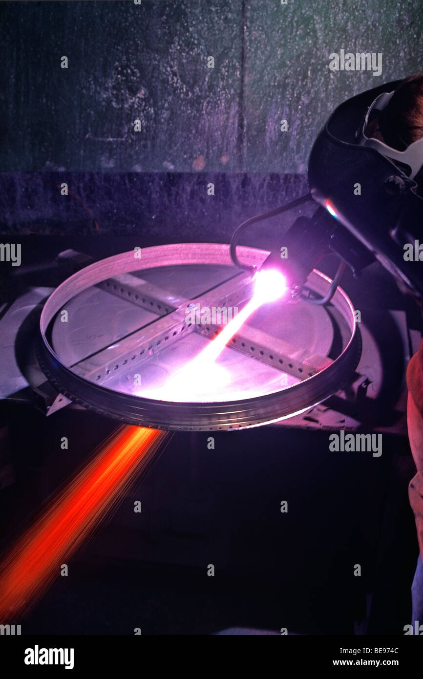 thermal spray coating of metal component by worker Stock Photo - Alamy