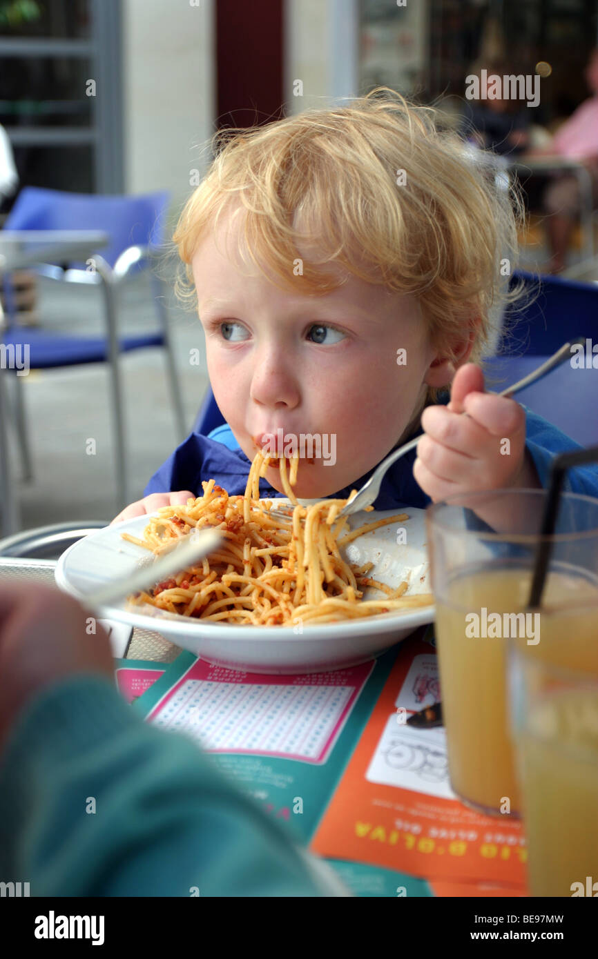 Young Boy Eating Spaghetti Bolognaise Stock Photo - Alamy