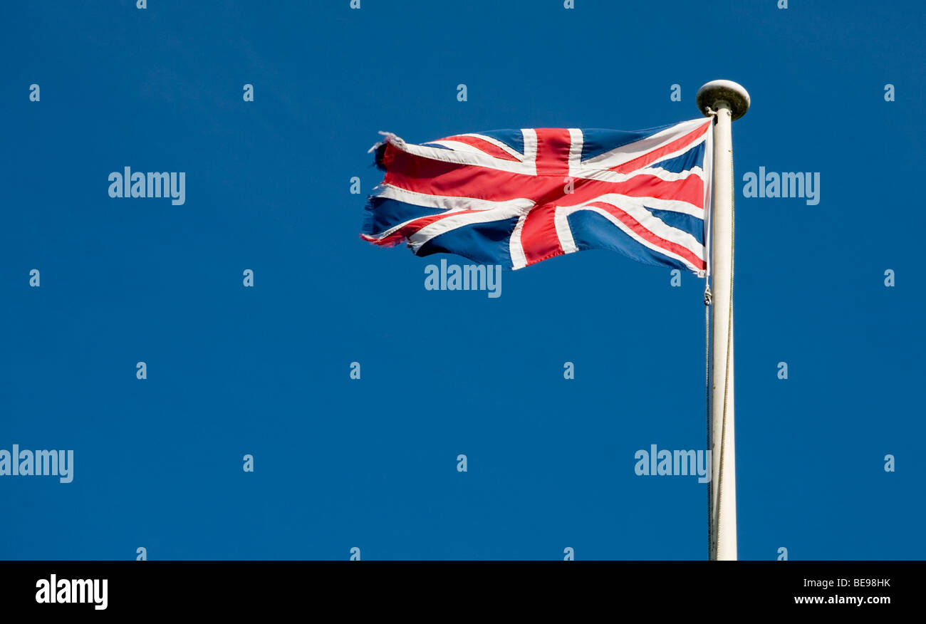 Union Jack flying in a clear blue sky Stock Photo - Alamy