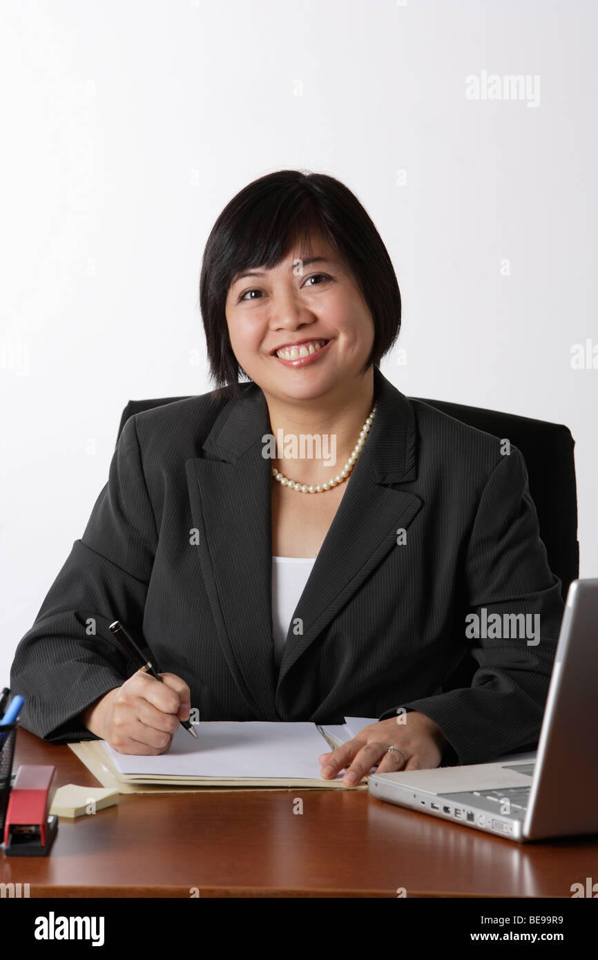 Filipino woman working hi-res stock photography and images - Alamy