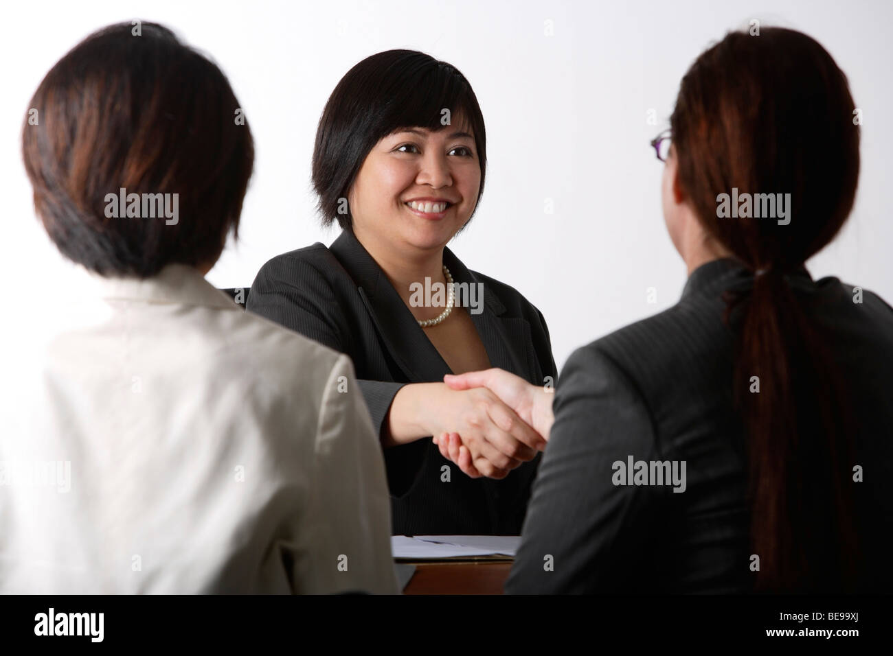 business woman shaking hands Stock Photo - Alamy business woman shaking hands Stock Photo - Alamy