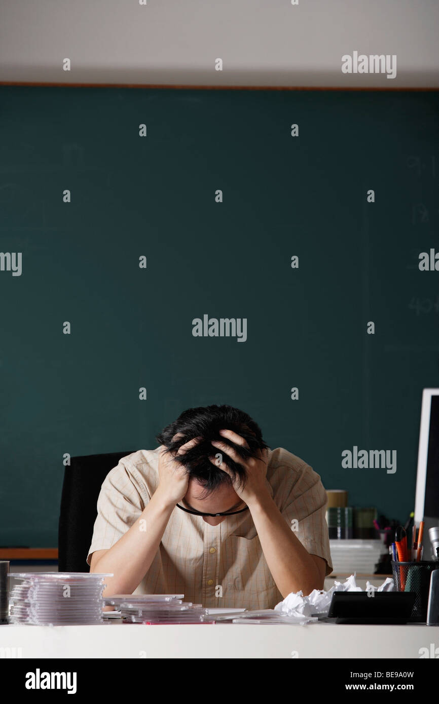 Stressed teacher hi-res stock photography and images - Alamy
