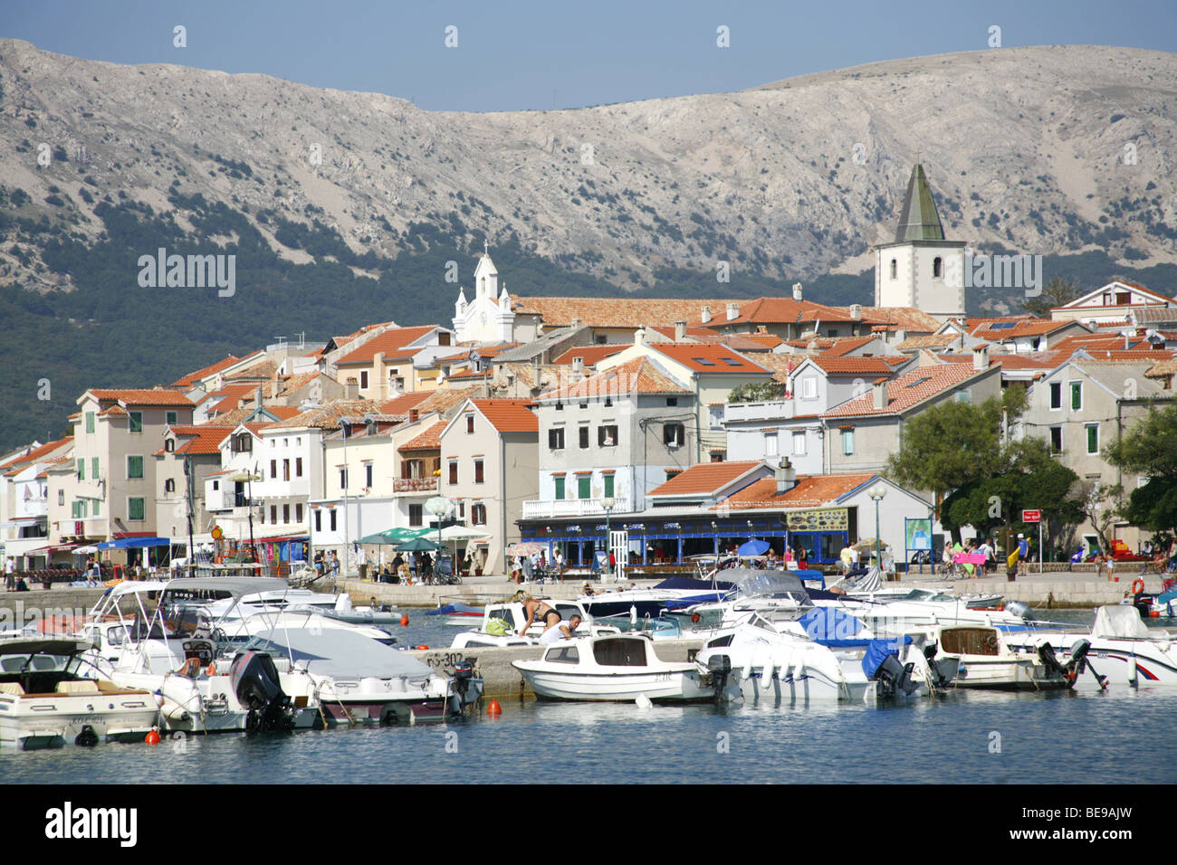 View of krk island with harbour and baska town hi-res stock photography ...