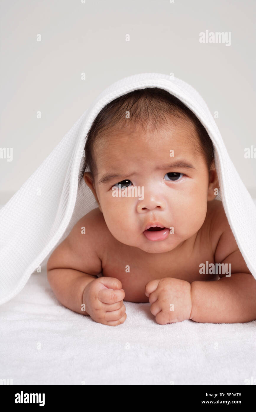 Chinese baby looking sad Stock Photo - Alamy