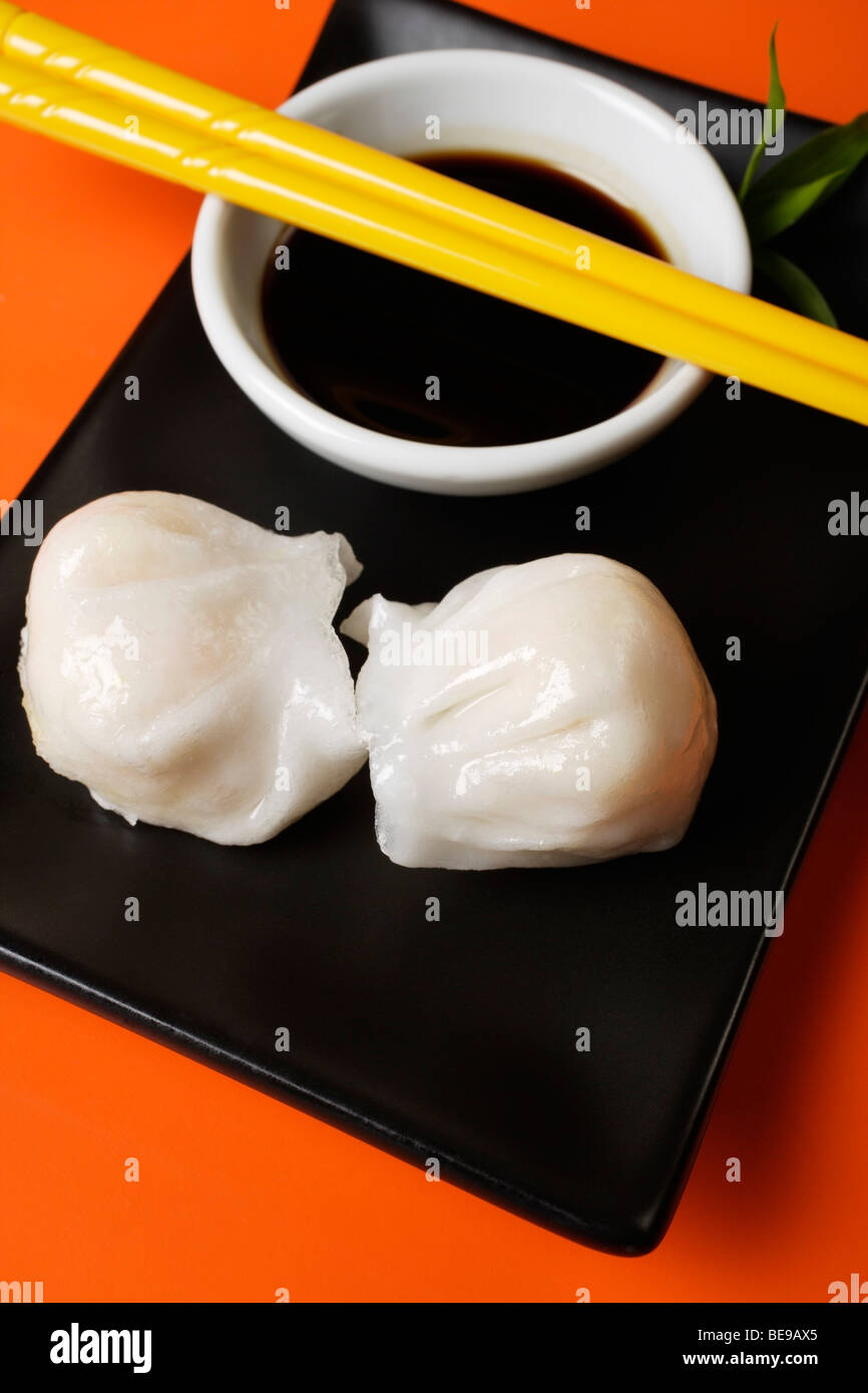 Dim sum on plate with soy sauce Stock Photo - Alamy