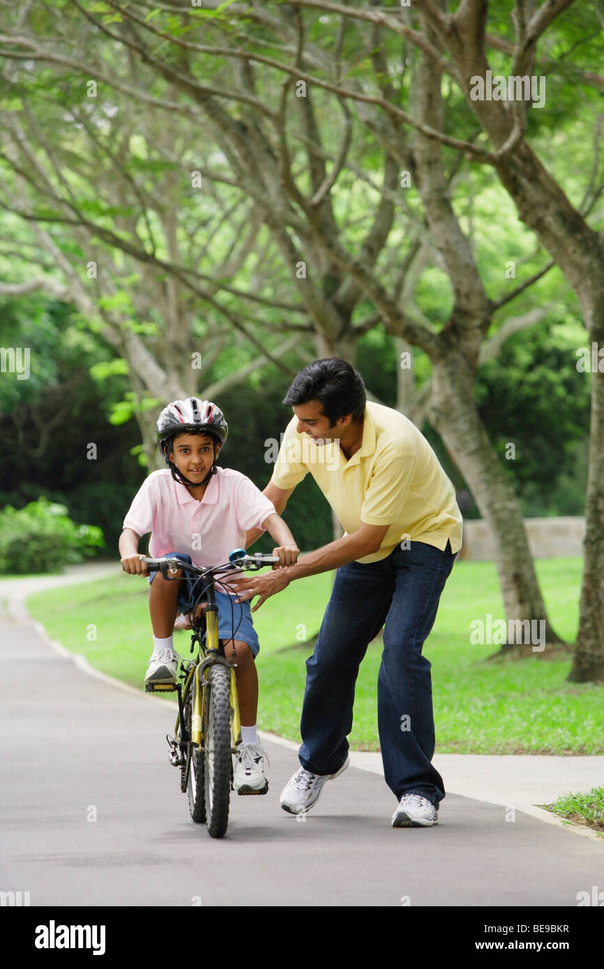Teaches son bike hi-res stock photography and images - Alamy