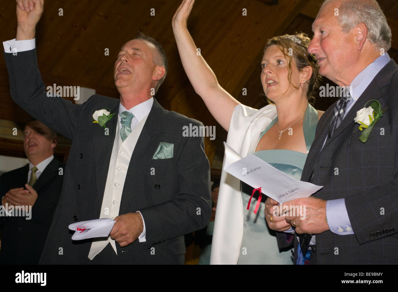 Bride and Groom Singing At Their Wedding Stock Photo - Alamy