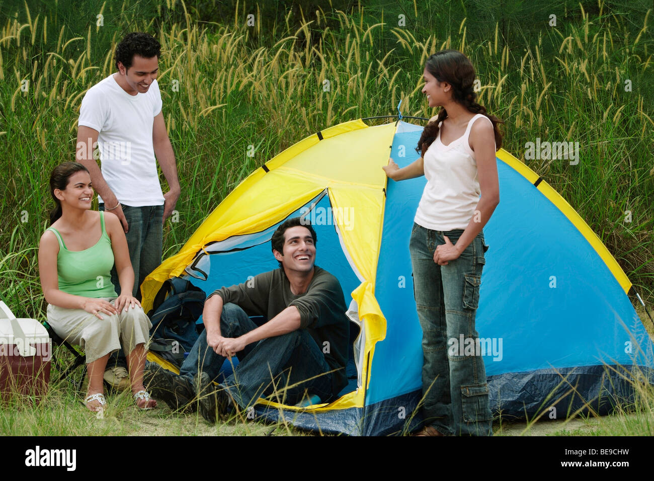 Young friends camping in the wilderness hi-res stock photography and ...