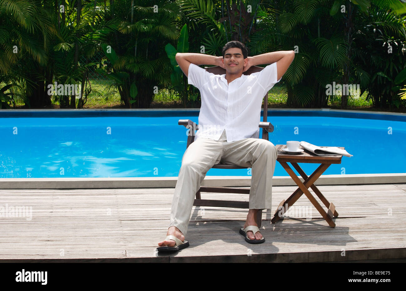 Indian man outdoor swimming pool hi-res stock photography and images ...