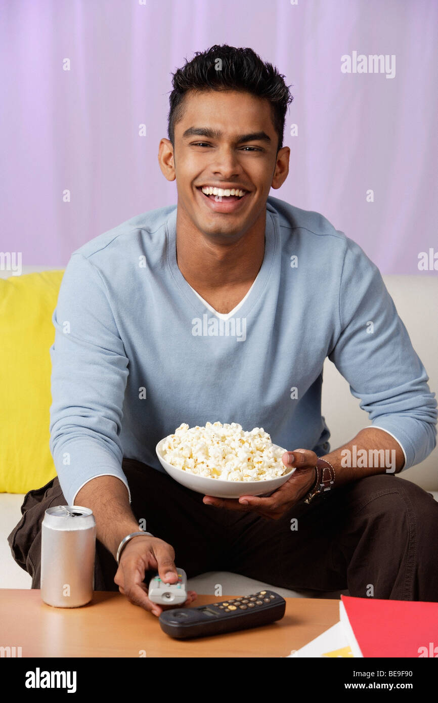 Man sweatshirt holding drink hi-res stock photography and images - Alamy