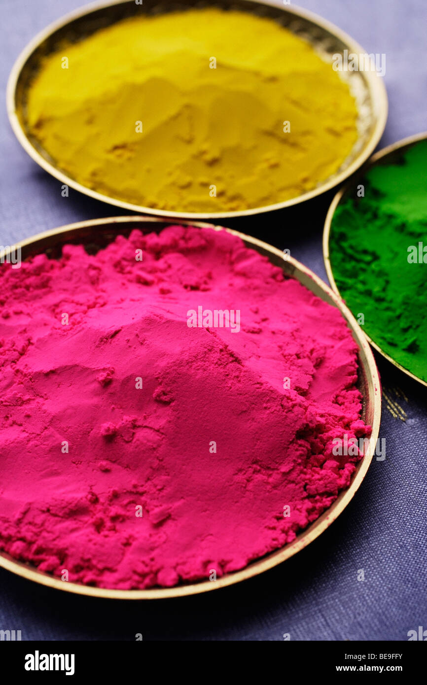 pink, yellow and green Indian powder paints closeup Stock Photo - Alamy
