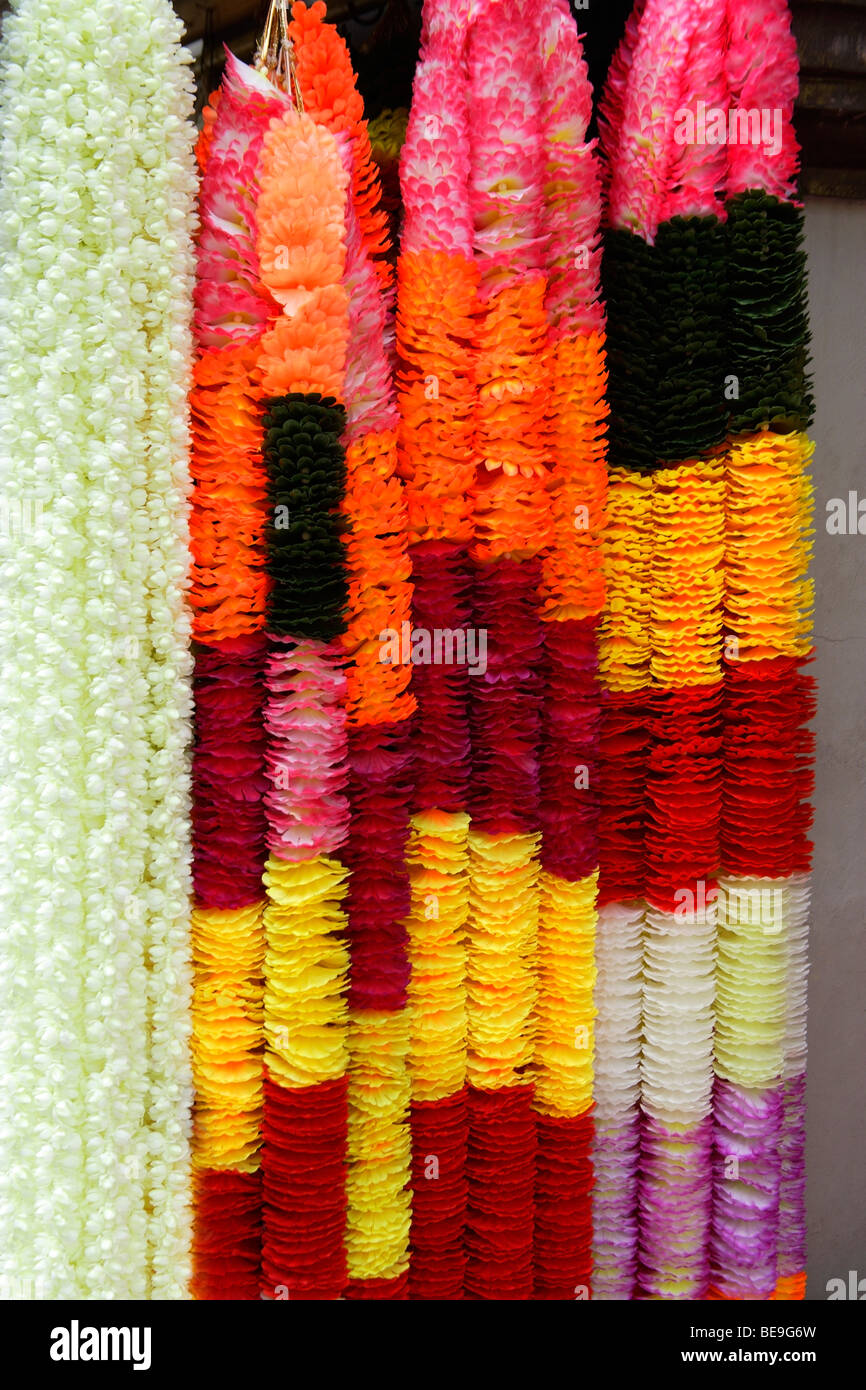 Hanging garlands in market place Stock Photo - Alamy