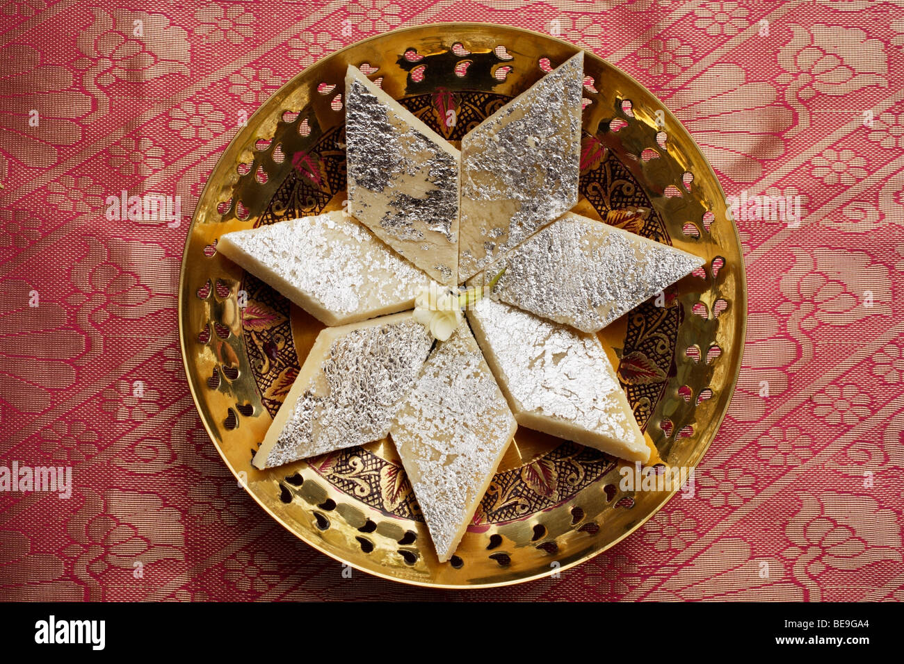 Indian sweets in star shape Stock Photo - Alamy