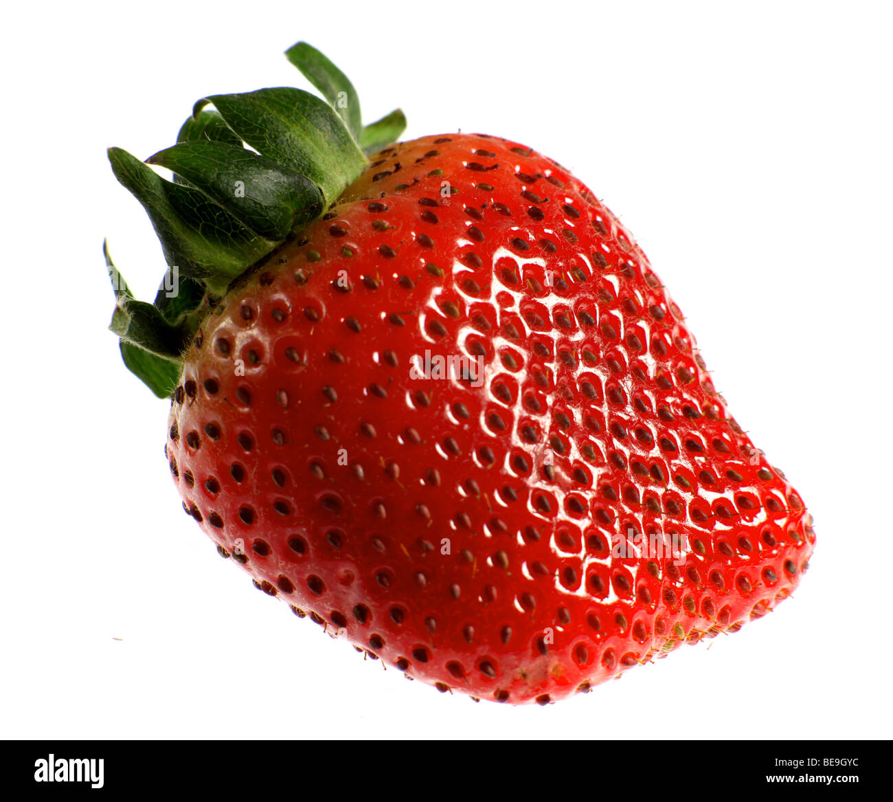 A single strawberry isolated on a white background Stock Photo - Alamy