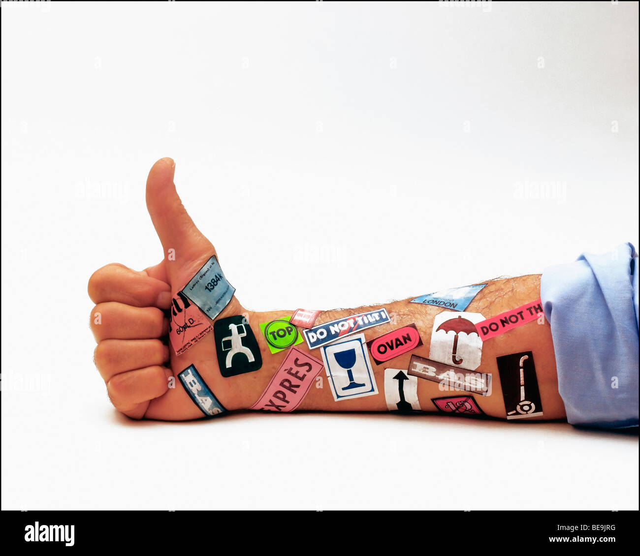 Man's forearm with shipping labels Stock Photo - Alamy