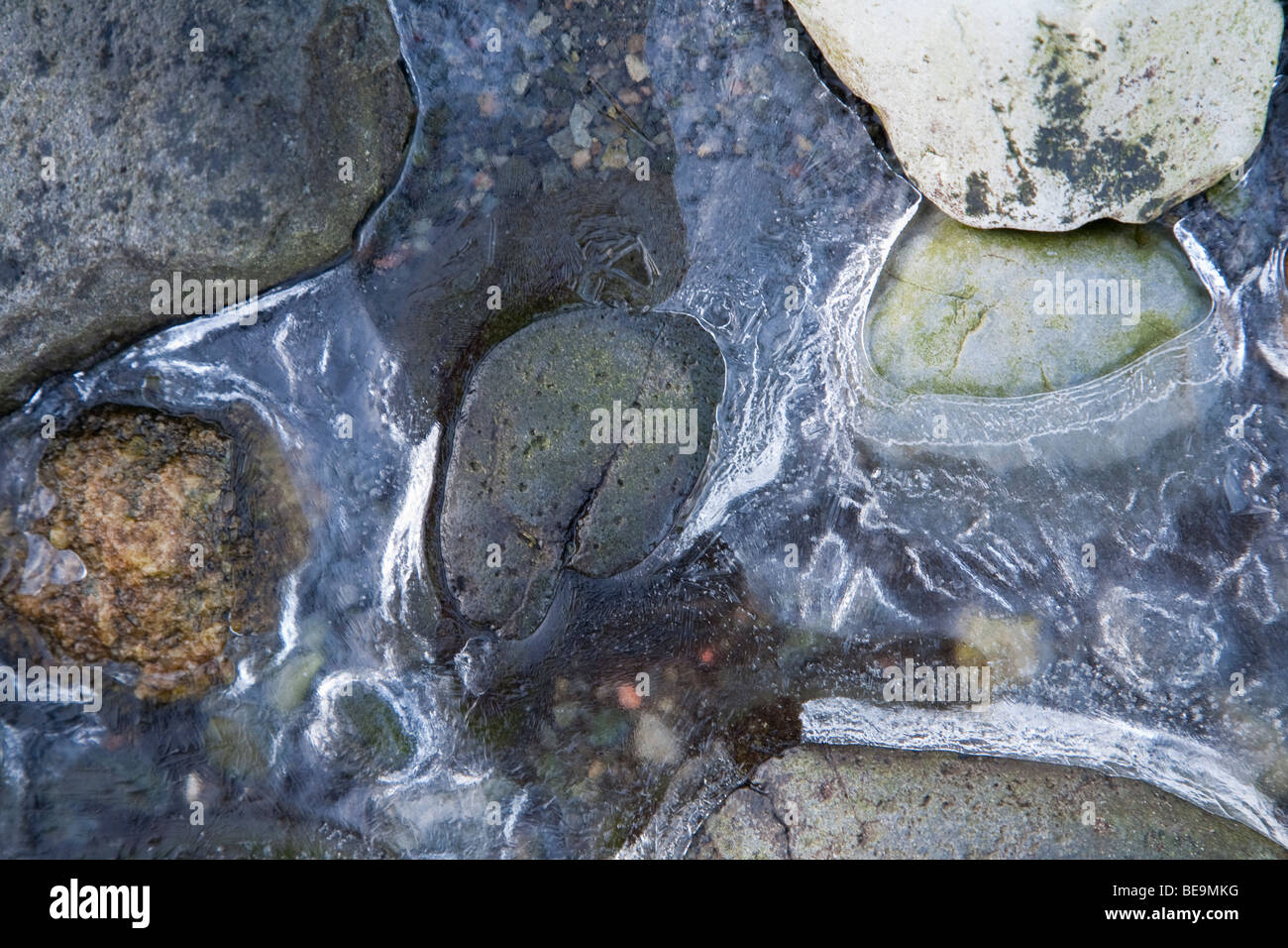 Ice and rocks Stock Photo - Alamy