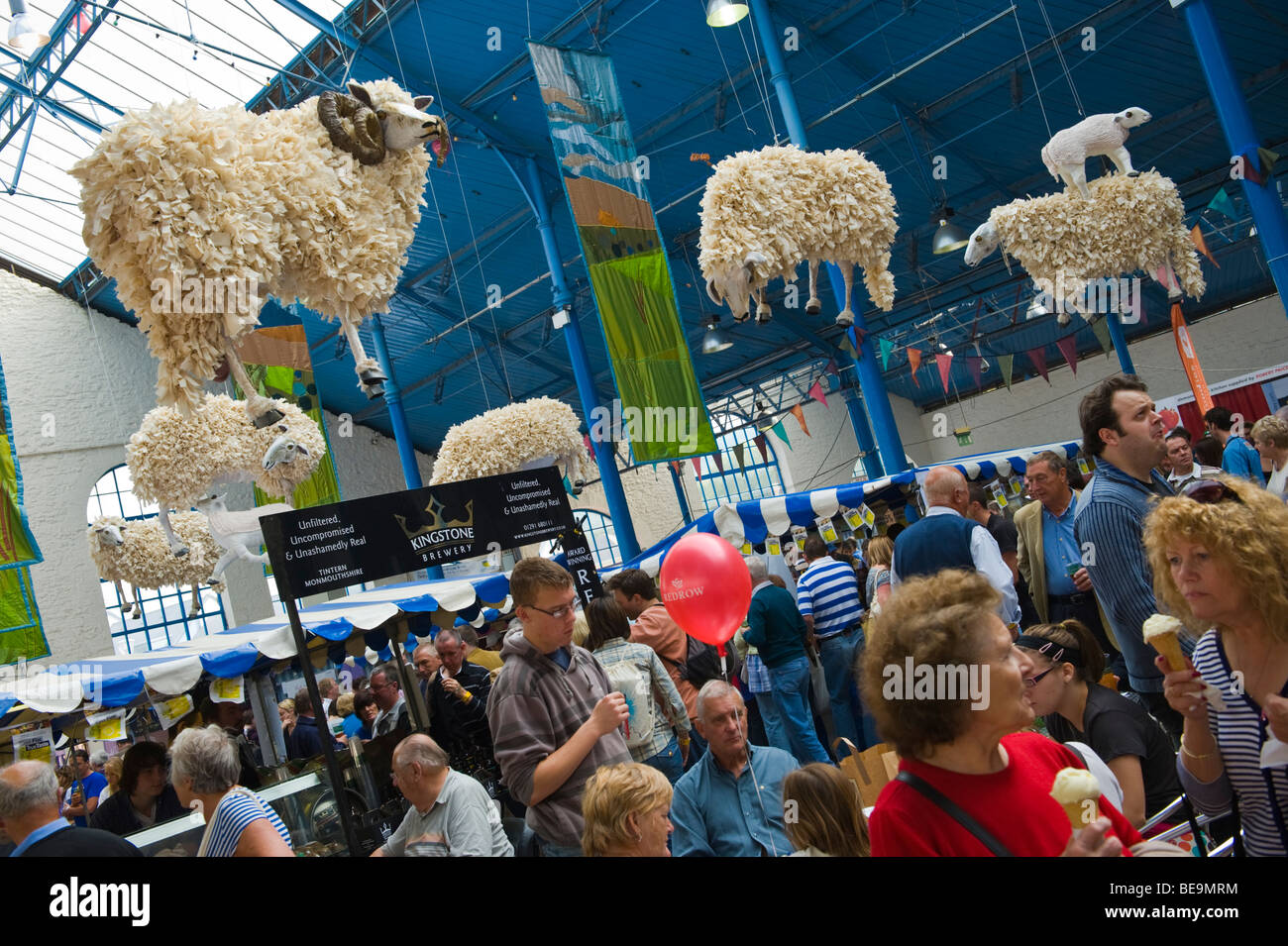 Flock of textile sheep hanging from roof of Market Hall at Abergavenny ...