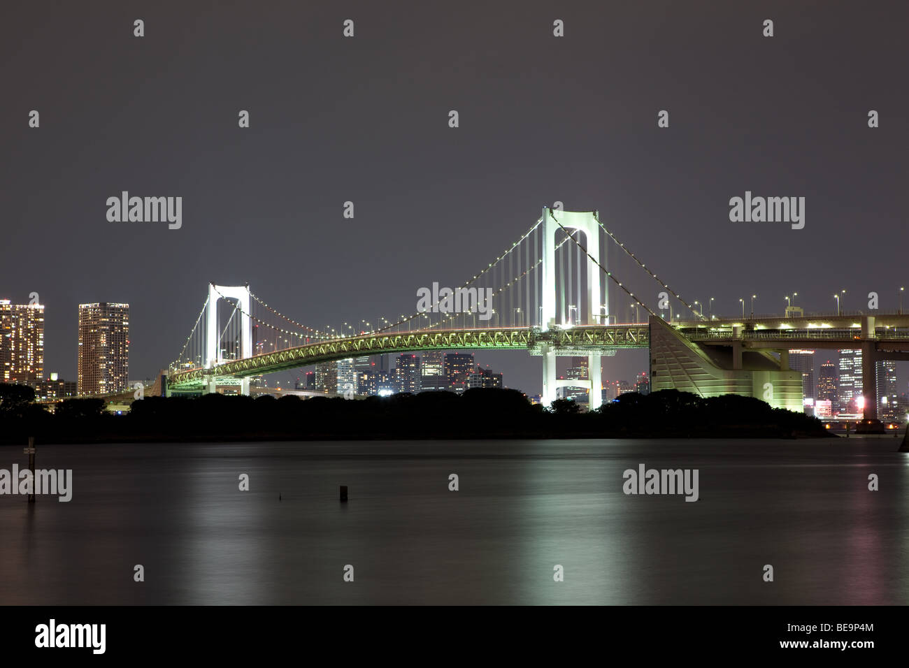 Rainbow bridge at night in Tokyo Japan - For Editorial Use Only Stock ...