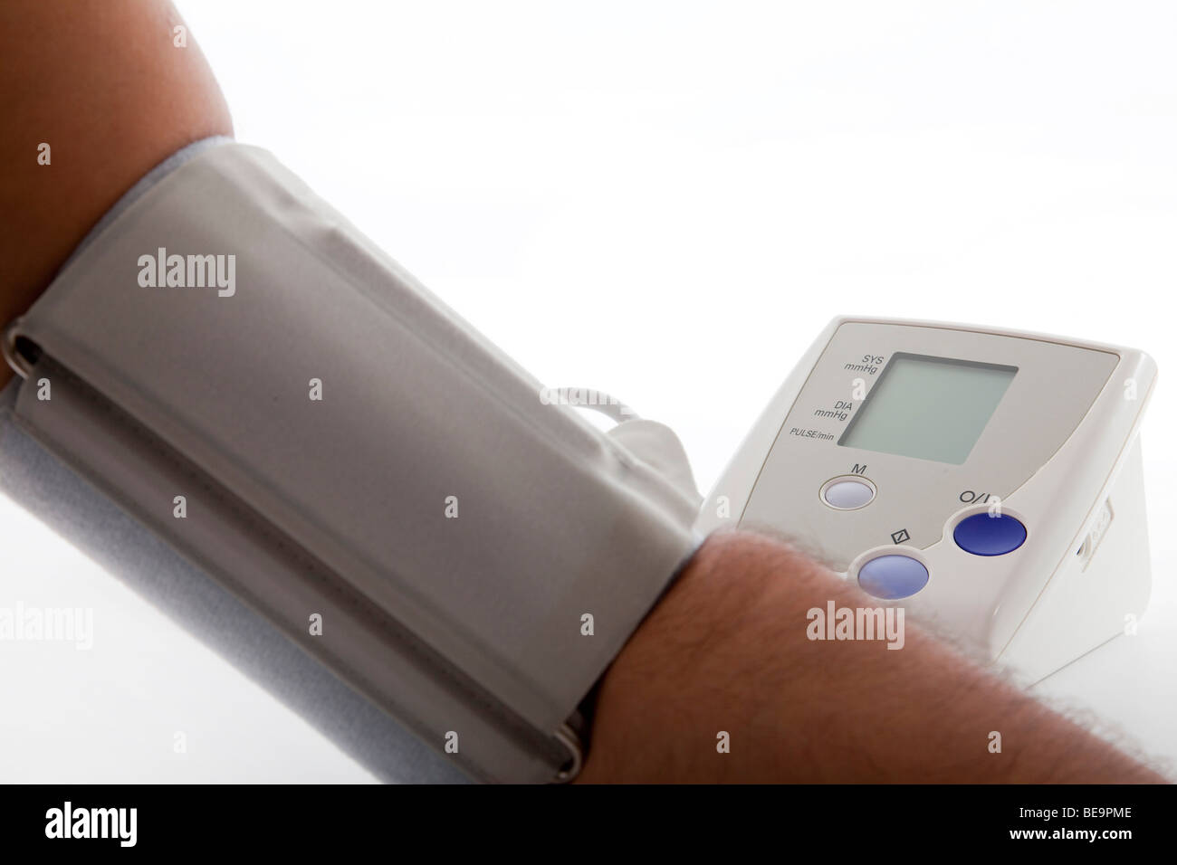 Hypertension - Blood Pressure and heart rate monitor device on white ...