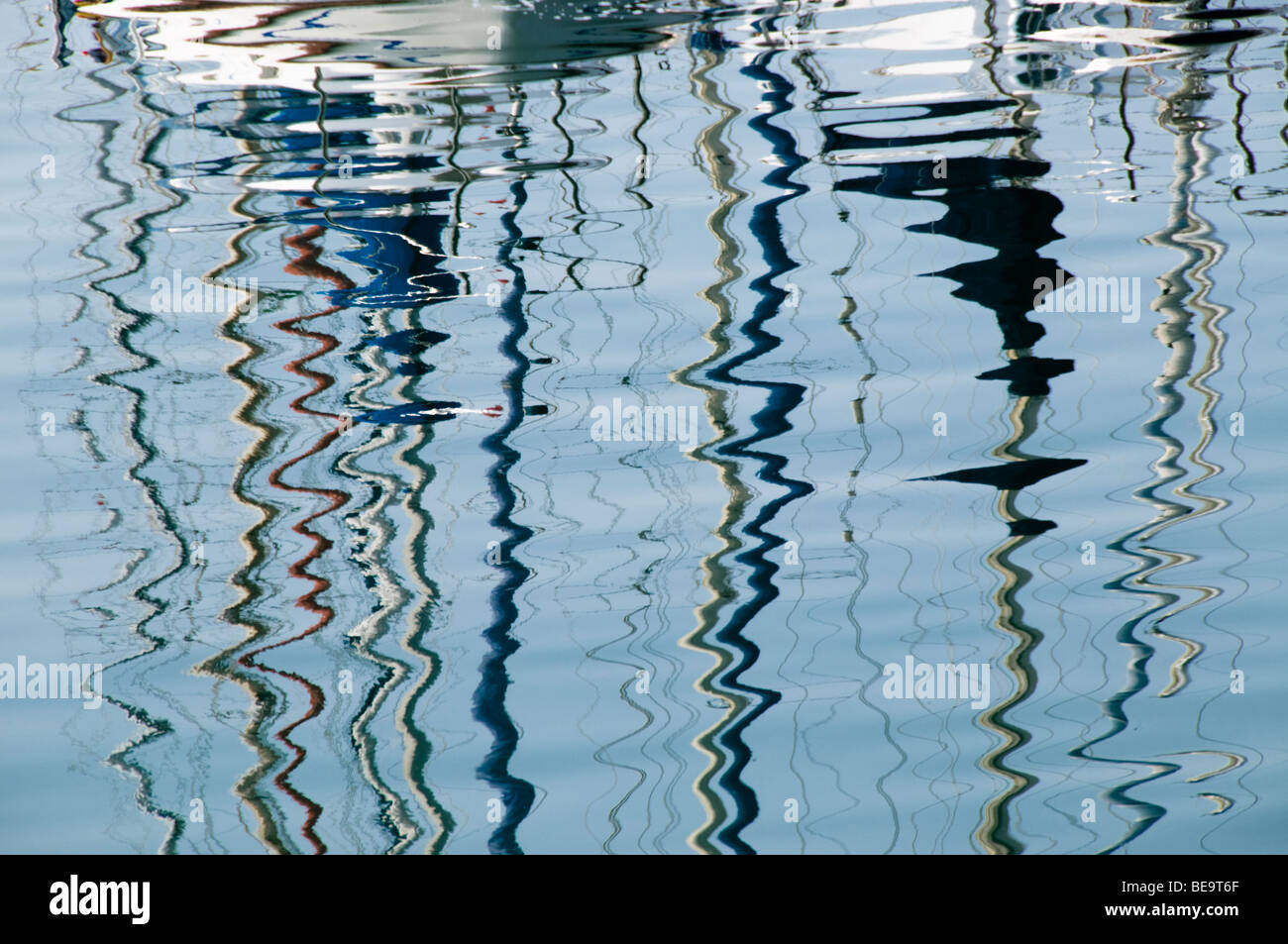Reflections of masts, Brixham Harbour, Devon, UK Stock Photo - Alamy