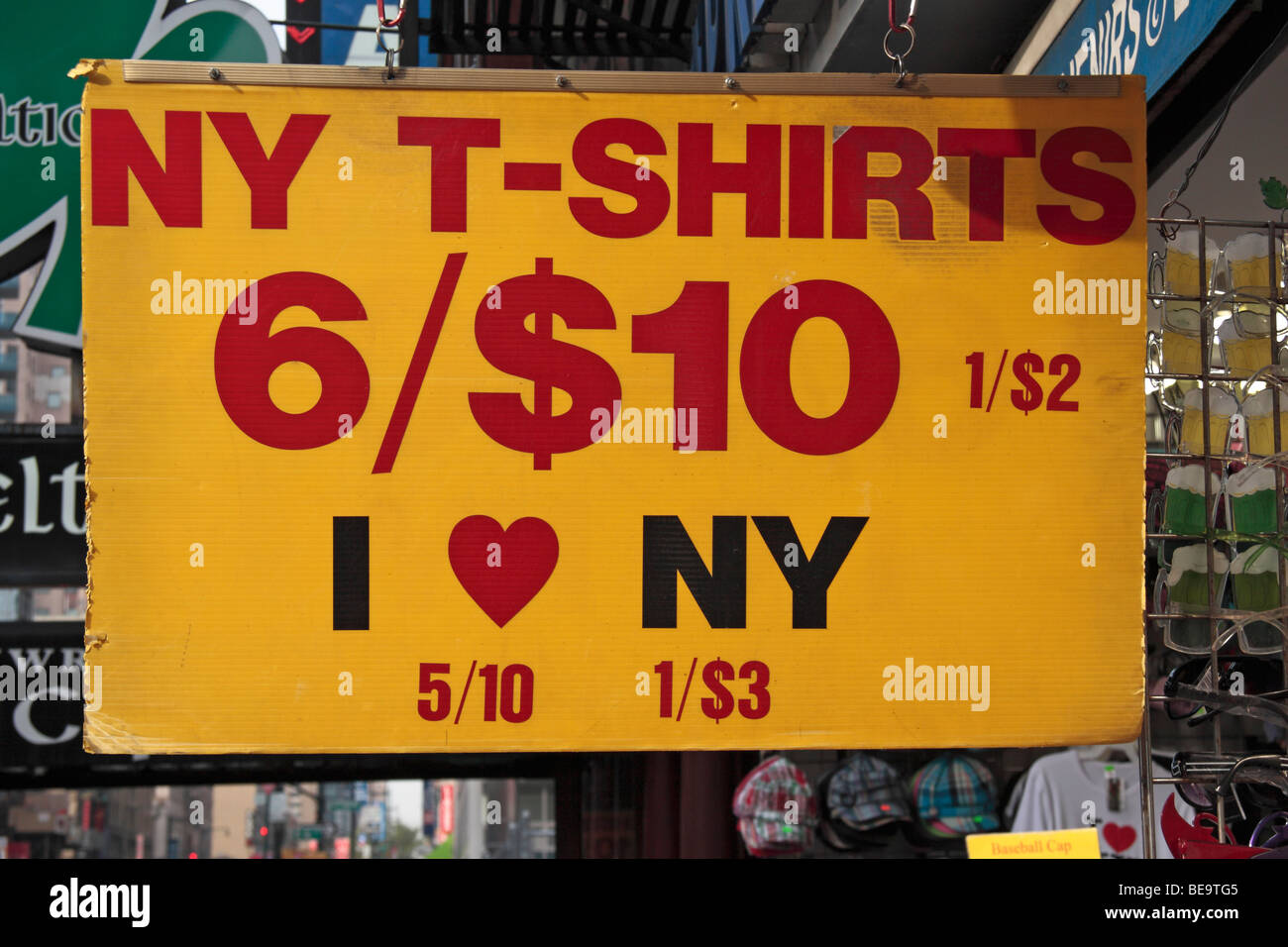 A shop sign advertising t-shirts in New York, United States Stock Photo ...