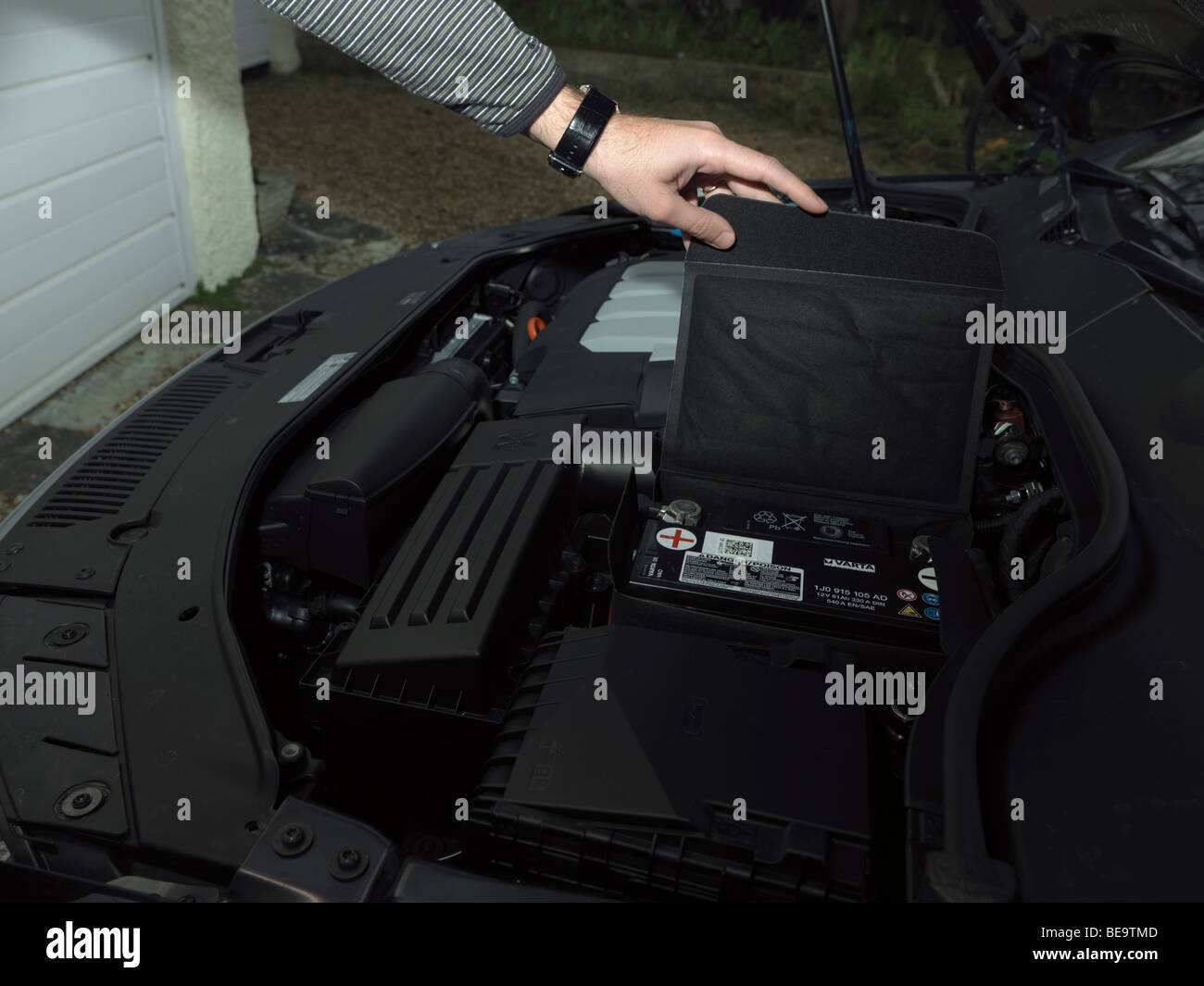 Checking Car Battery Stock Photo - Alamy
