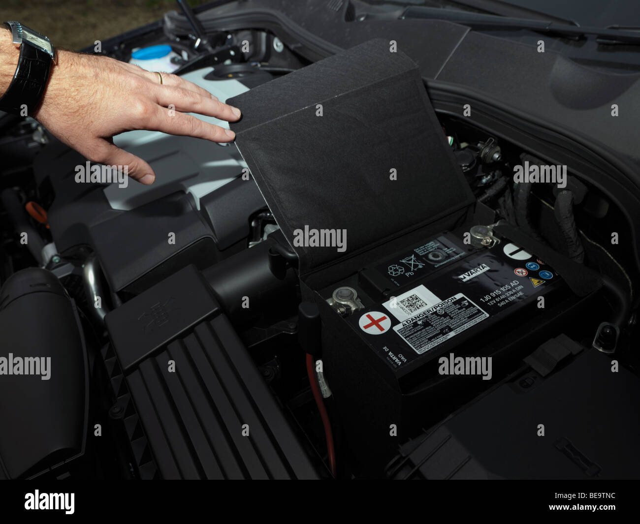 Checking Car Battery Stock Photo - Alamy
