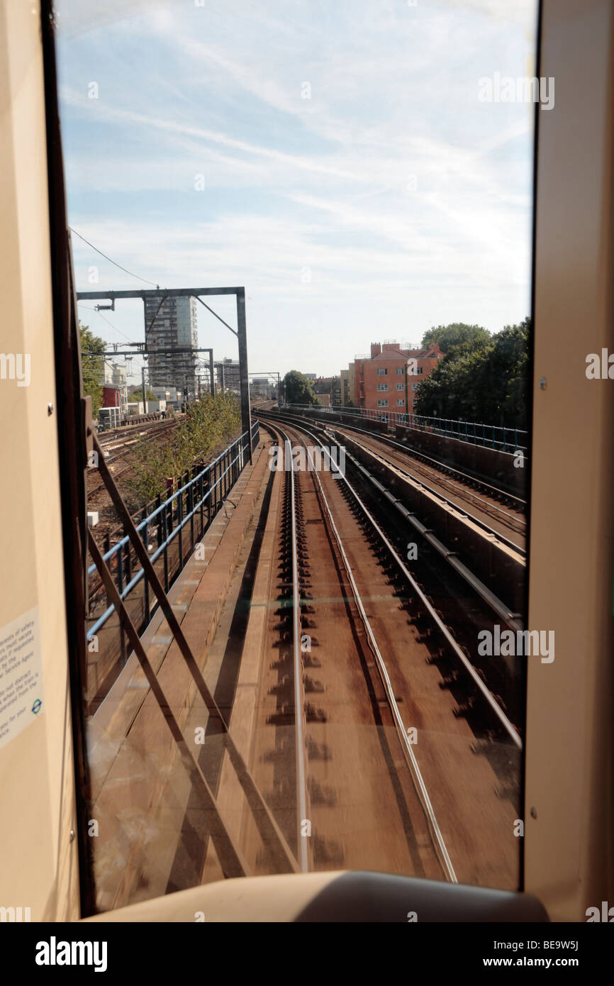 View from the front carriage of a Docklands Light Railway (DLR) train ...