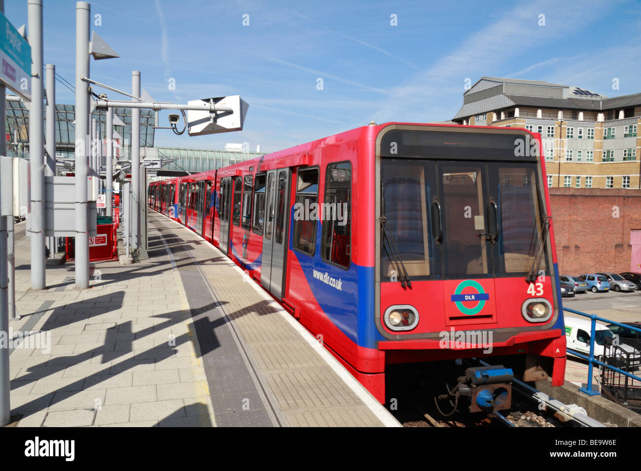 A Docklands Light Railway train pulling in to the platform at Poplar ...