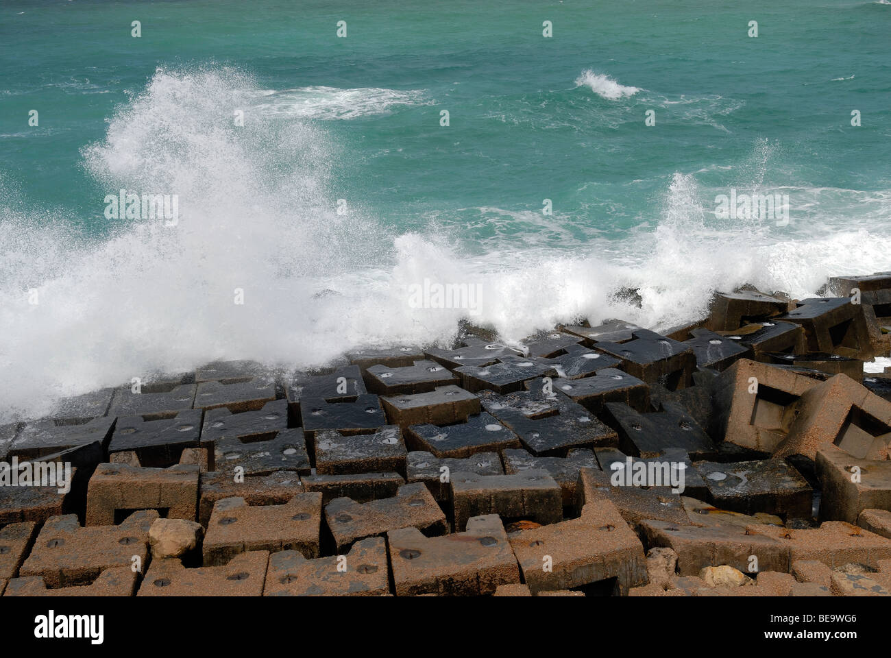 Waves breaking on a jetty of Alexandria harbor, Egypt Stock Photo - Alamy