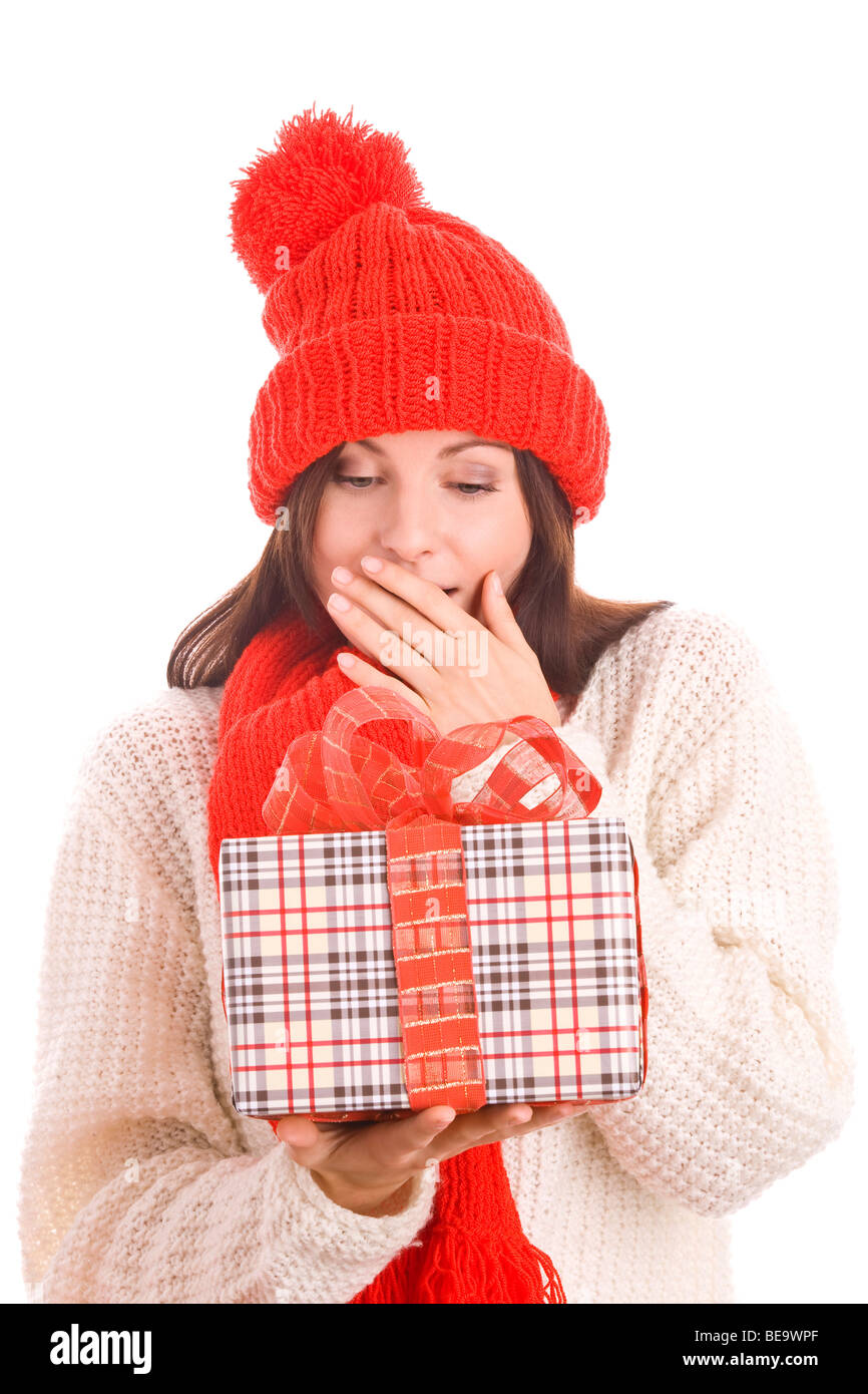Surprised woman holding gift isolated on white background Stock Photo ...