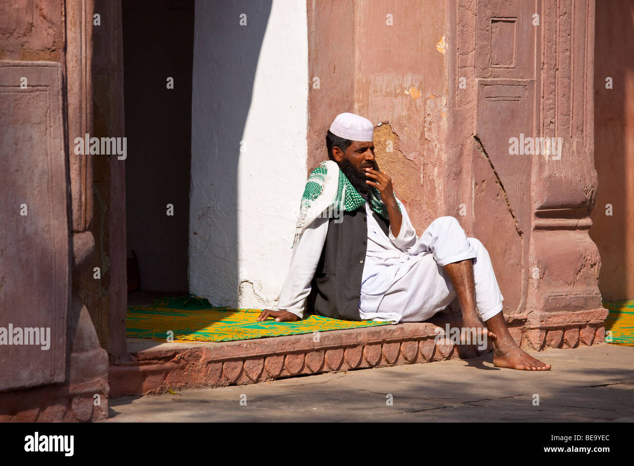 Muslim man at the mosque in Qutb Minar in Delhi India Stock Photo - Alamy