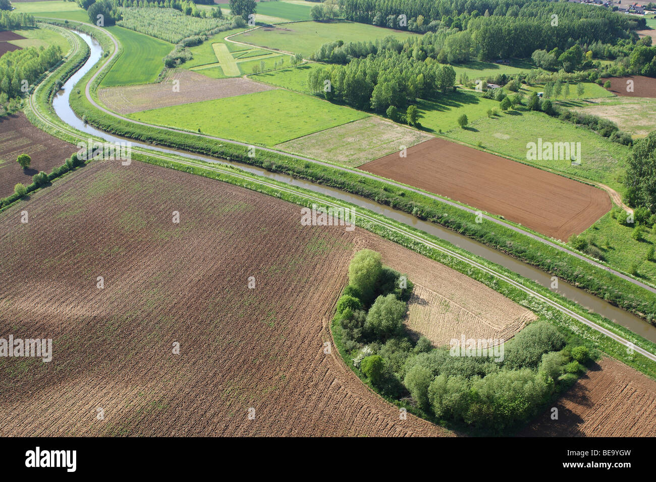 Fields and forested old meander along river Demer, valley of Demer ...