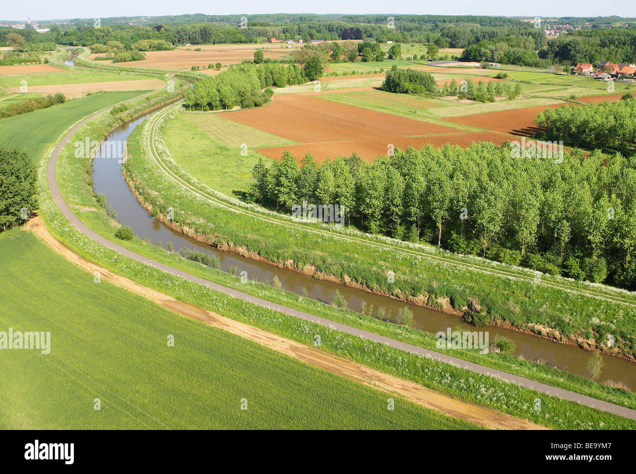 Fields, grasslands and forested area along river Demer, valley of Demer ...