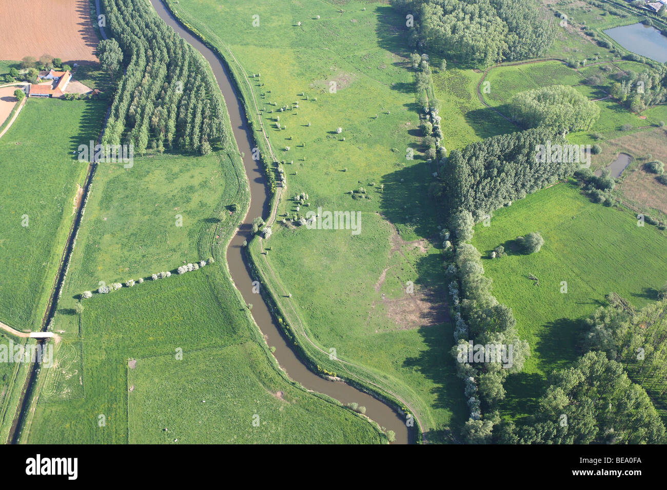 Fields, grasslands and forested area along river Demer, valley of Demer ...