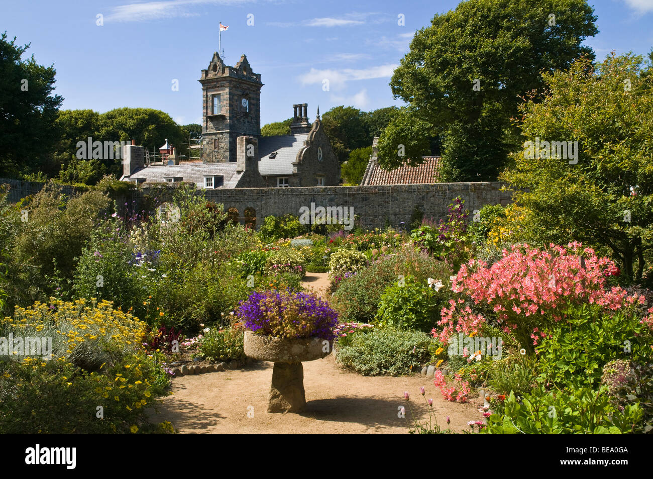 dh Seigneurie Gardens LA SEIGNEURIE SARK ISLAND Flower garden and house ...