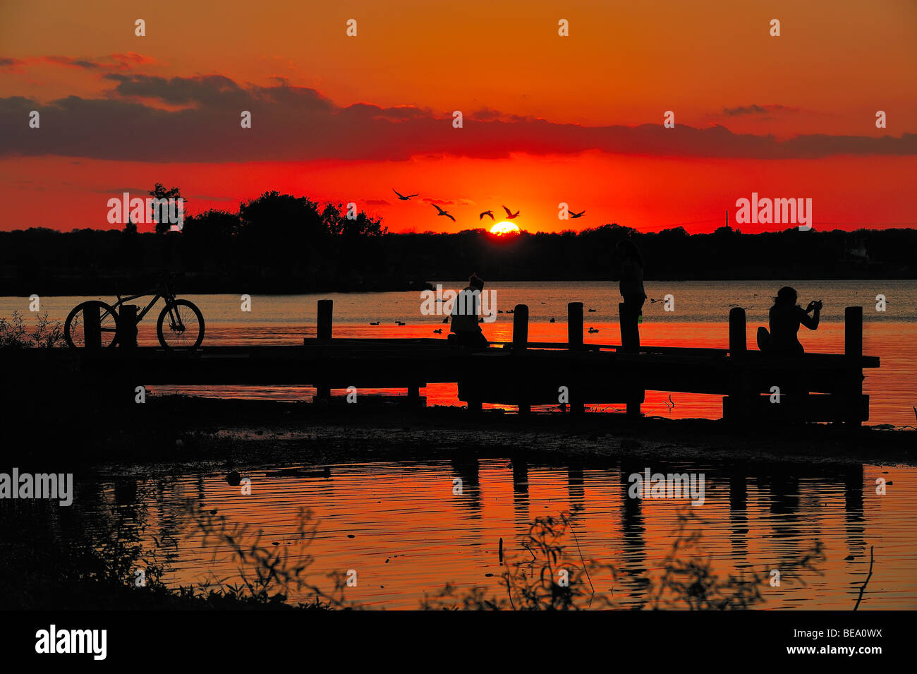 Red sunset over white rock lake hi-res stock photography and images - Alamy