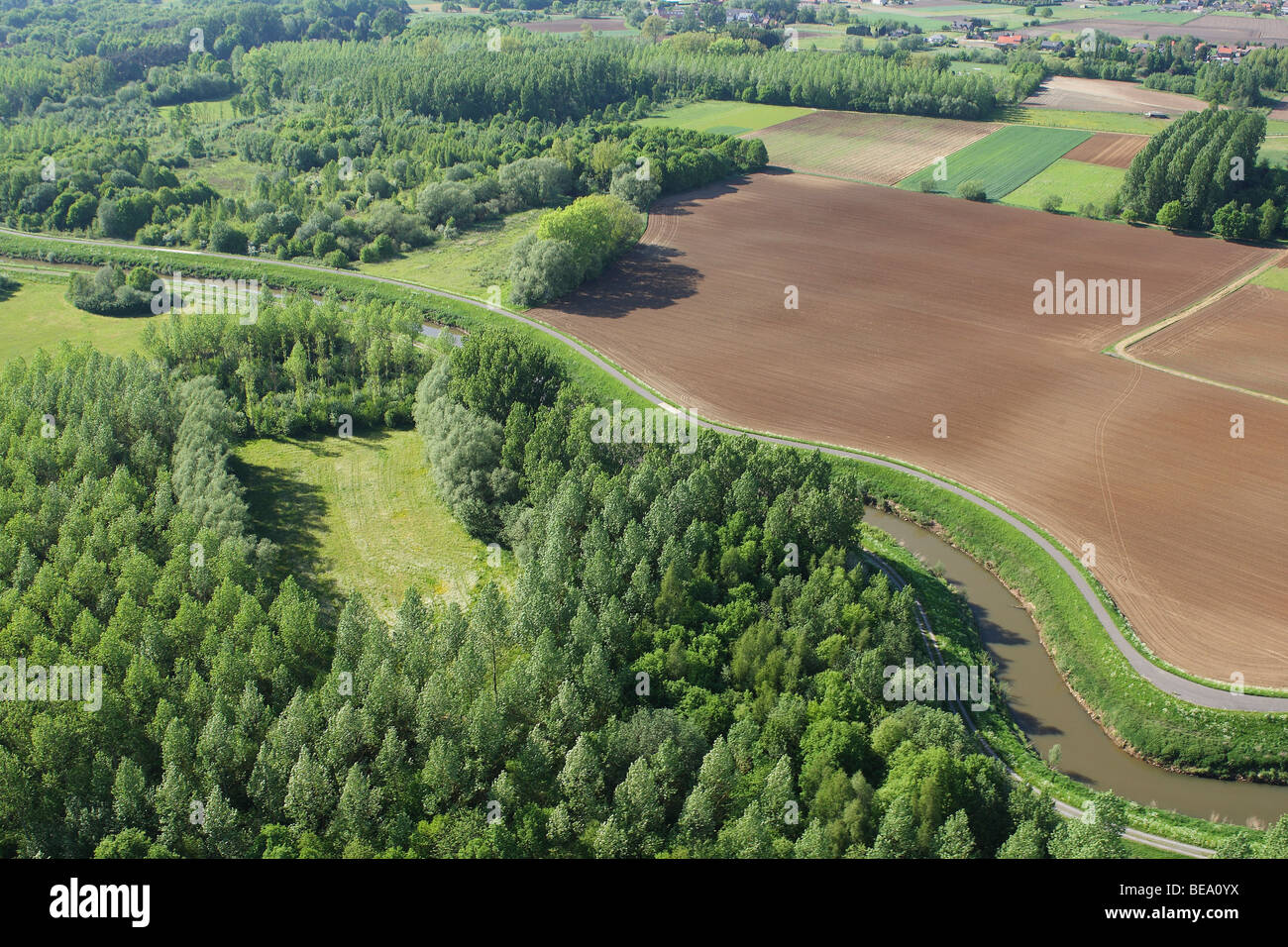 Fields, grasslands and forested area along river Demer, valley of Demer ...