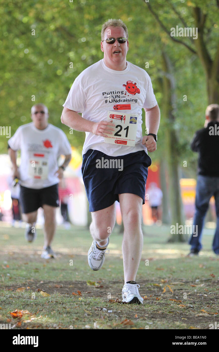 Runner in the fun run for Hertfordshire Air Ambulance at Fairlands ...